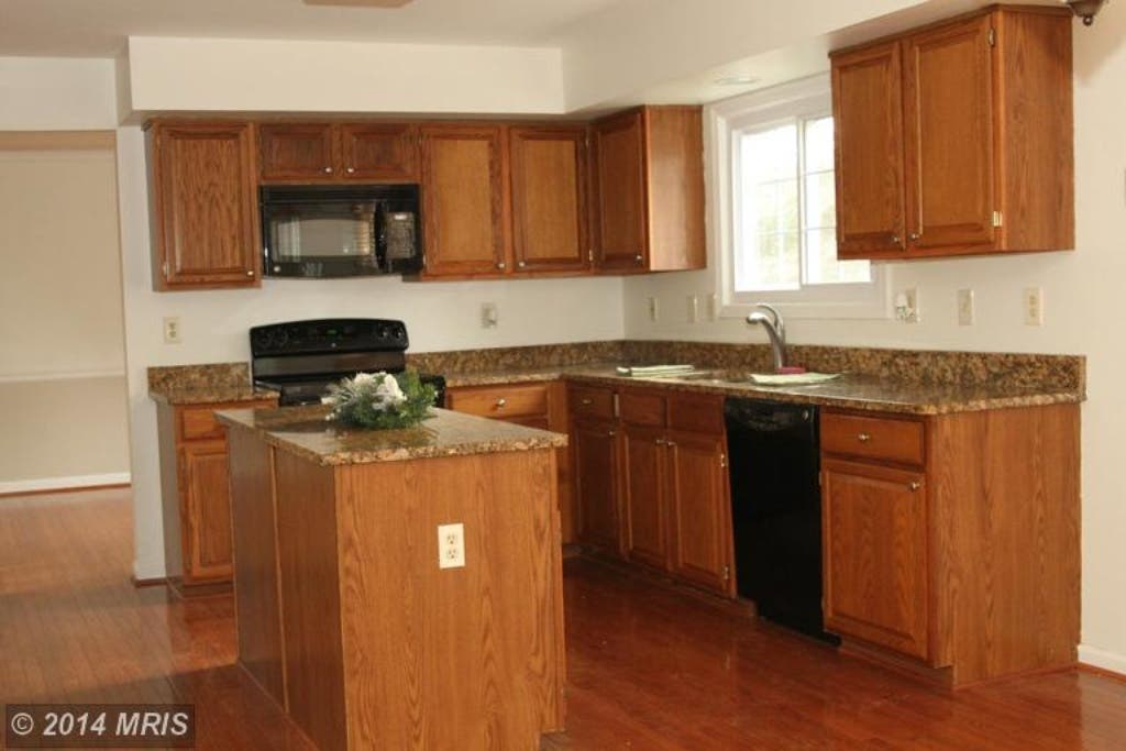 Home Spotlight: 'Soaring Masonry Fireplace' in $559K Brick Colonial ...