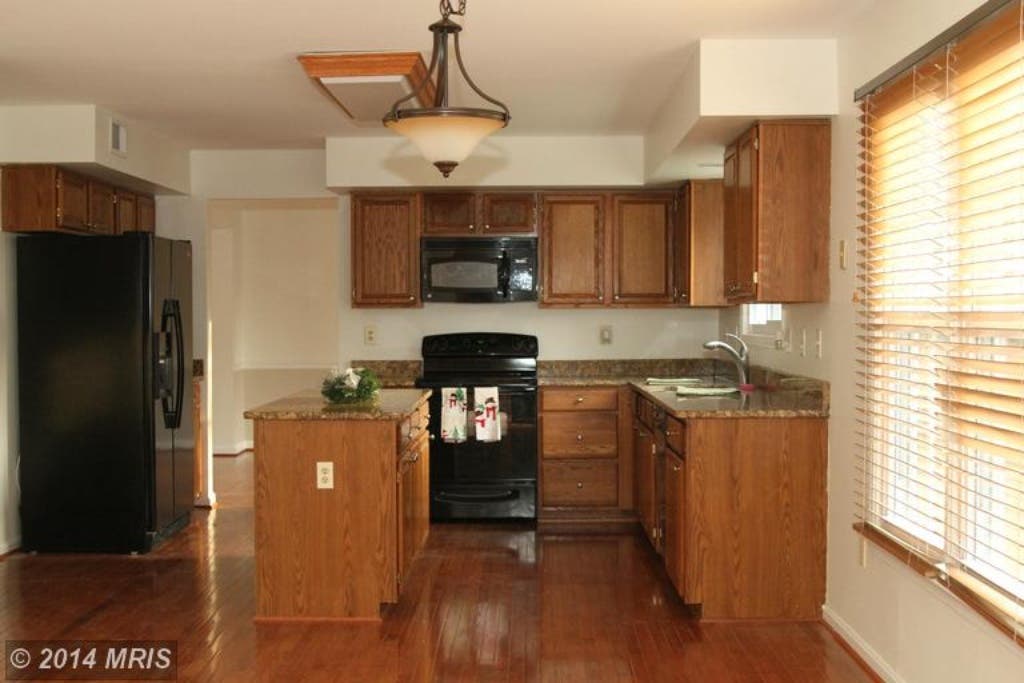 Home Spotlight: 'Soaring Masonry Fireplace' in $559K Brick Colonial ...