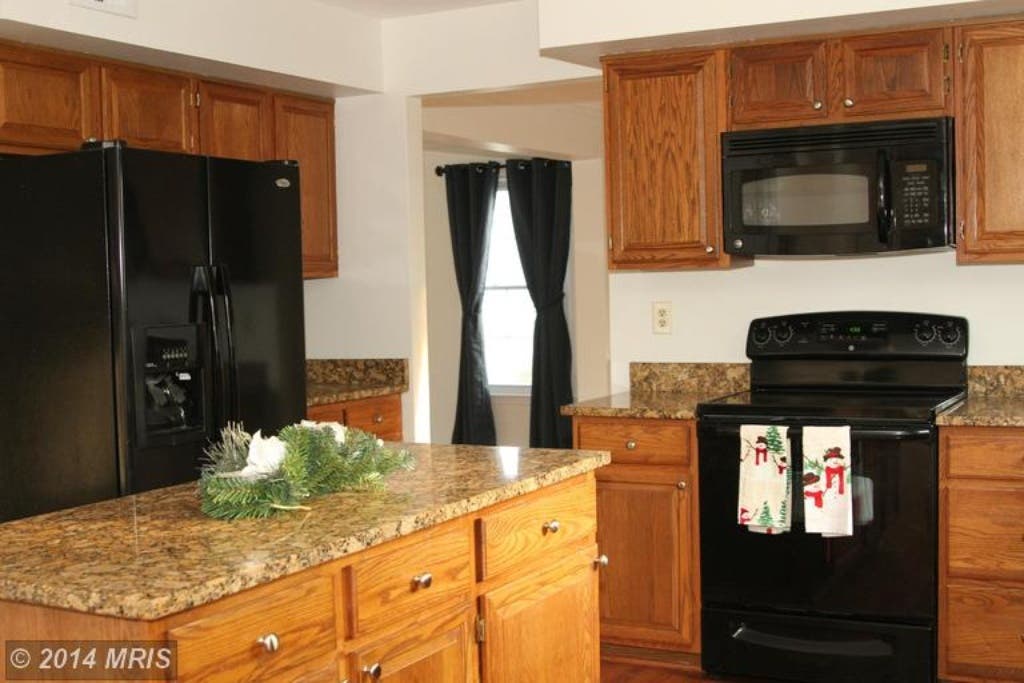 Home Spotlight: 'Soaring Masonry Fireplace' in $559K Brick Colonial ...
