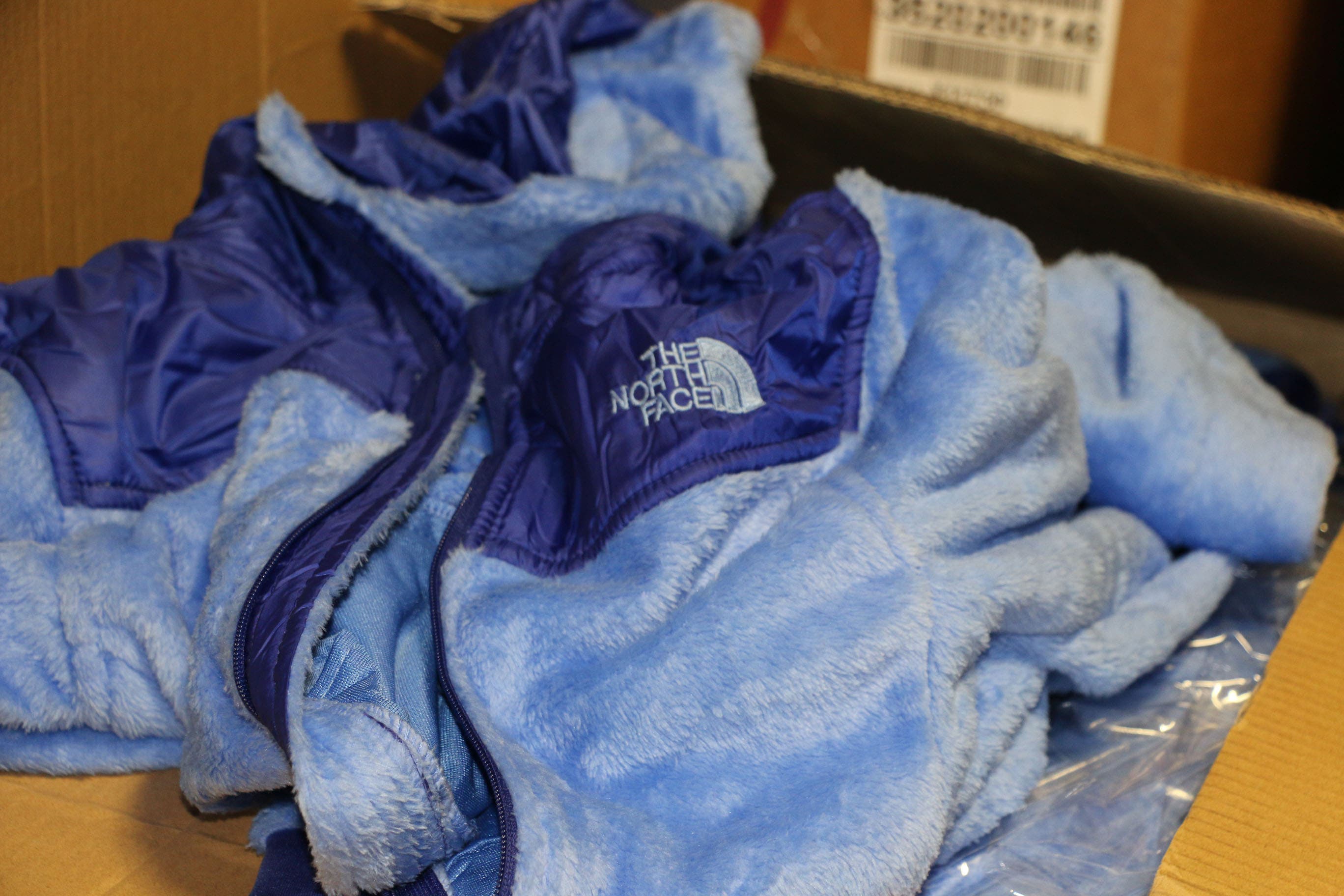 Long Island Retailer Had Thousands of Fake North Face Coats in ...