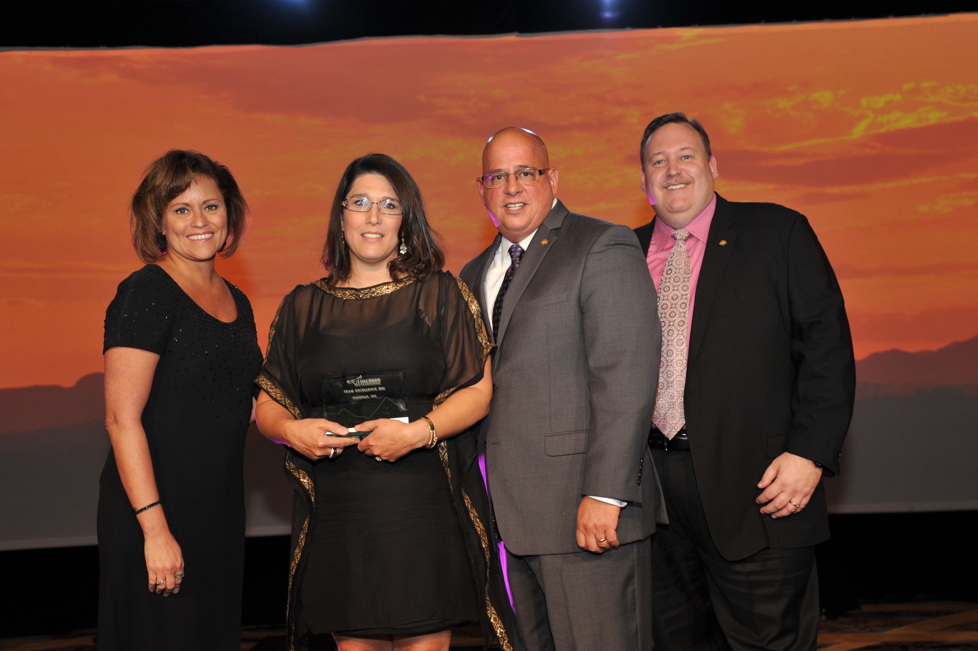 Tupper Accepts 'Team Excellence' Award for LongHorn Steakhouse | Nashua ...