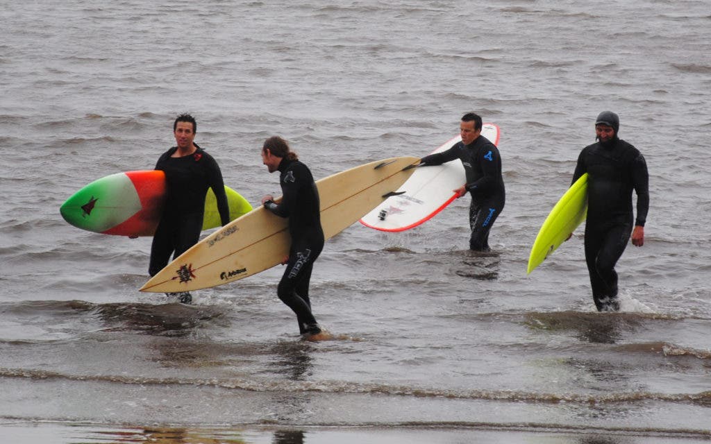 Family, Surfers Gather for Sion Milosky Paddle Out Memorial in Half ...
