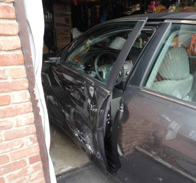 Merokean Pinned Between Car and Garage | Merrick, NY Patch
