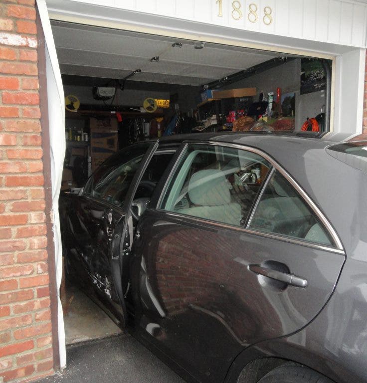 Merokean Pinned Between Car and Garage | Merrick, NY Patch