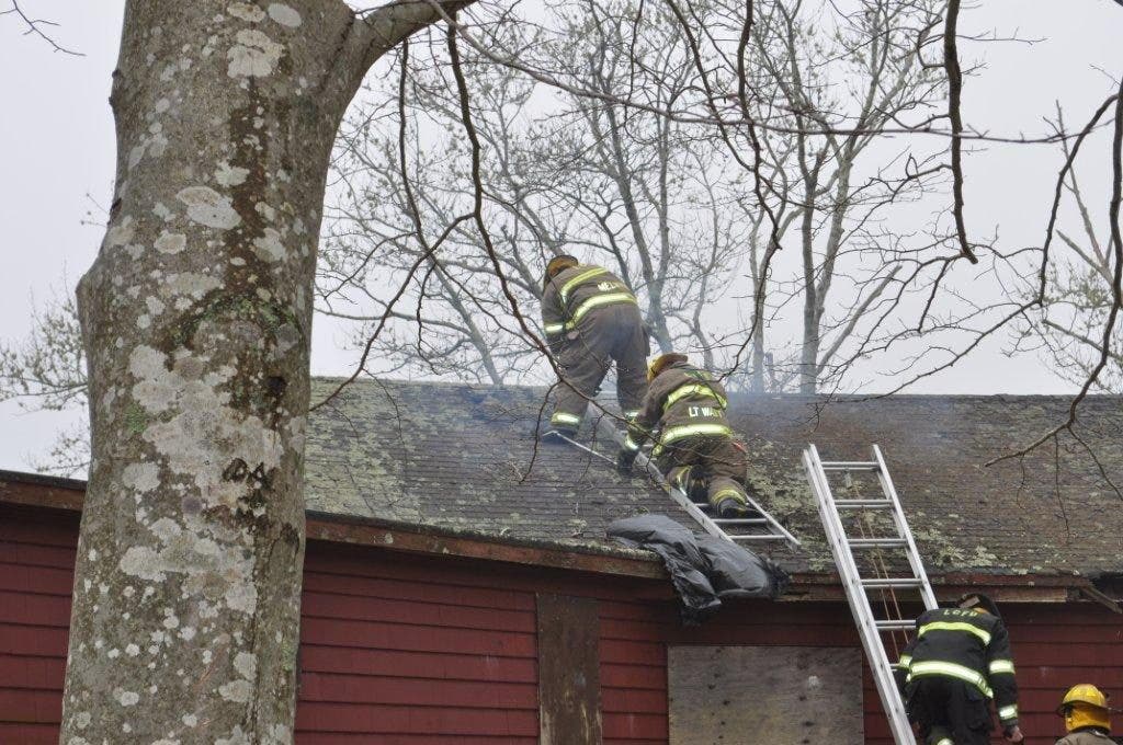 PHOTOS: Little Compton Fire Crews Knock Down Old Building For DEM ...