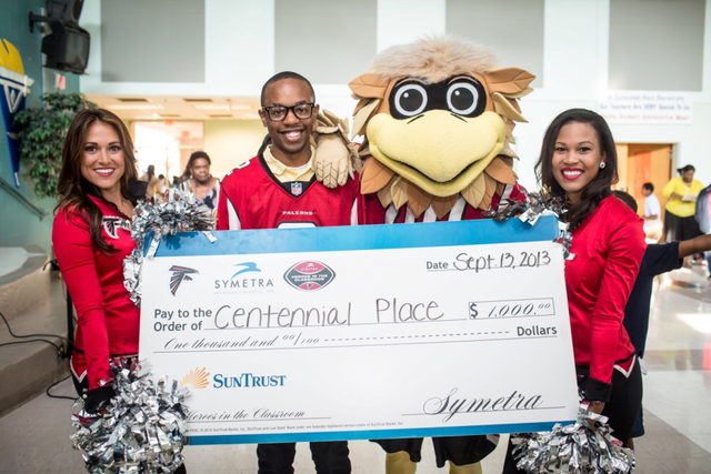 The Atlanta Falcons Honor Centennial Teacher Thomas Bussey as a ...