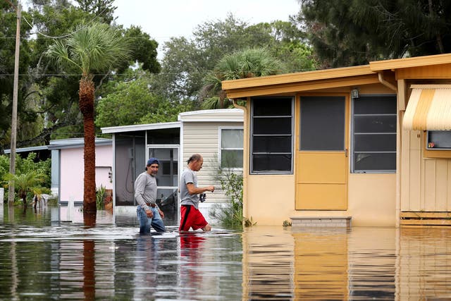 Homes Leveled, Flood Water Rescues: 33 Photos Of Idalia's Destruction ...
