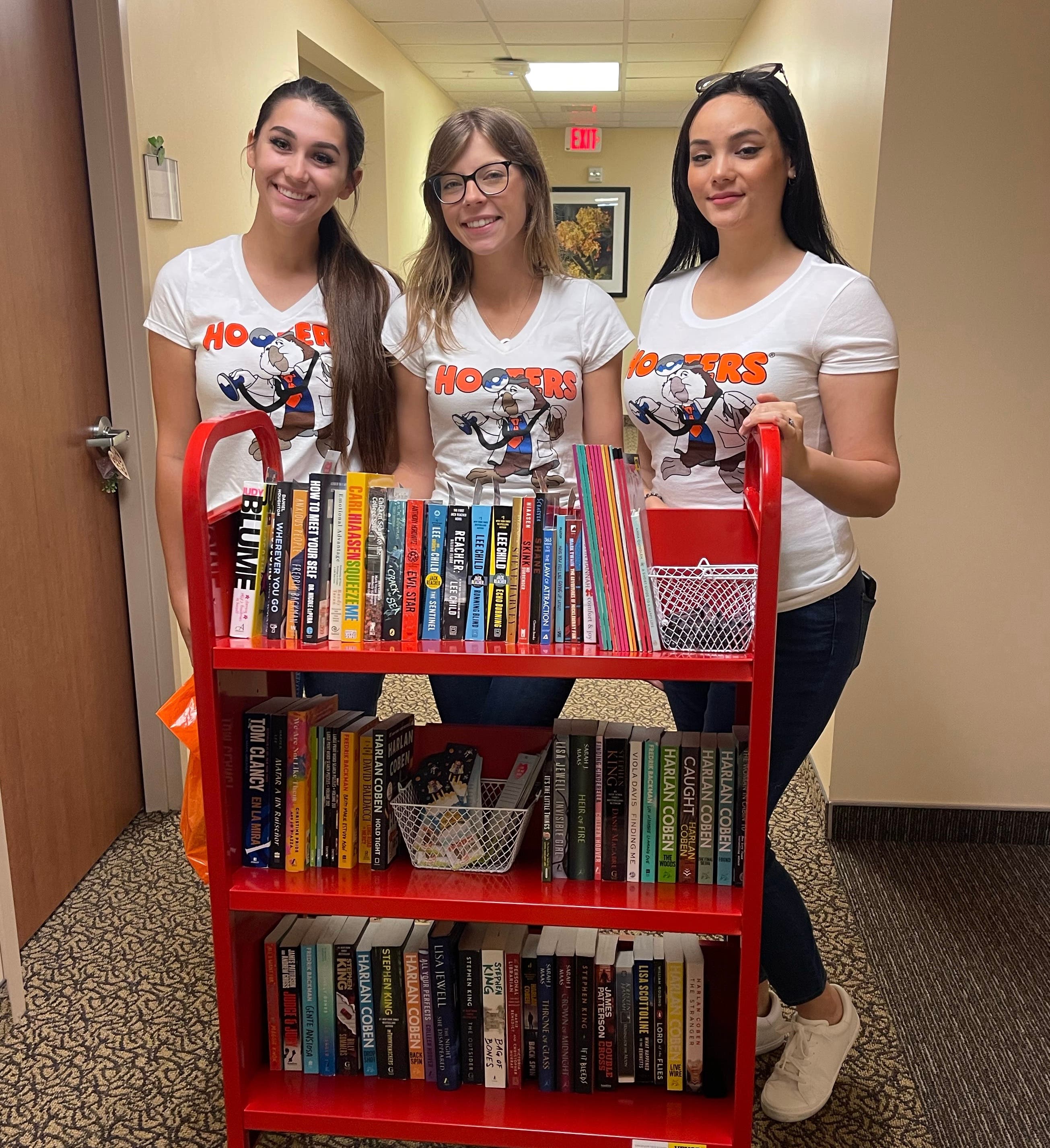 Fort Myers Hooters Donates More Books to Lee Regional Cancer Center ...