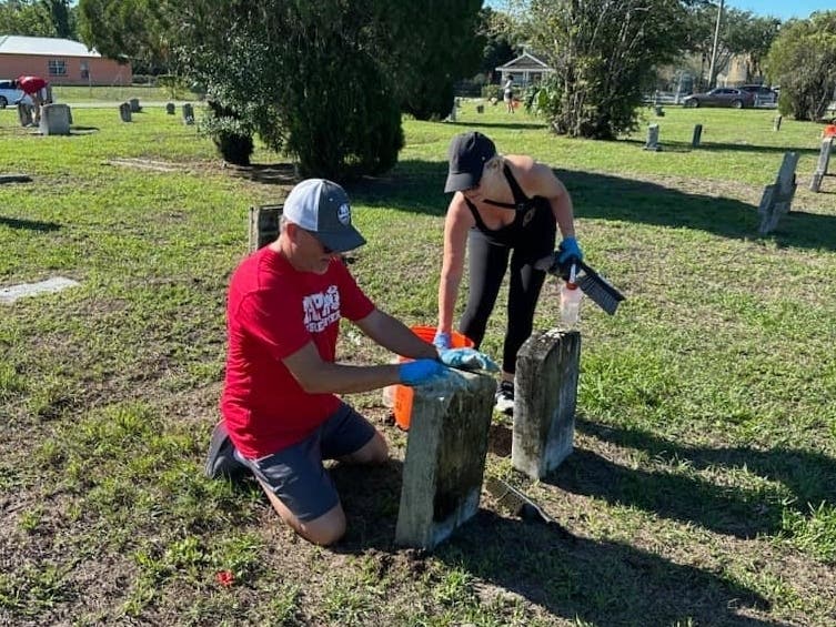 Tampa City Council Members Get Down And Dirty Cleaning Up Cemetery ...