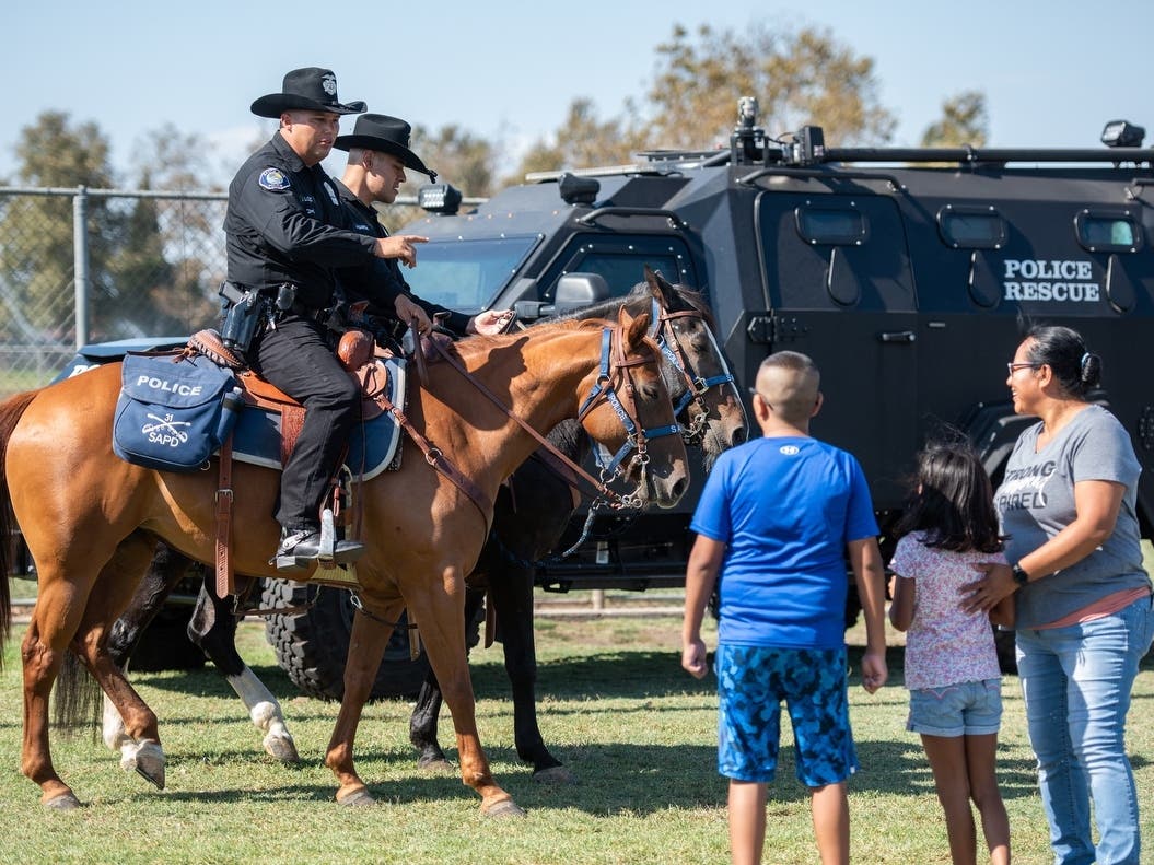 Community members gather together for Santa Ana's National Night Out ...